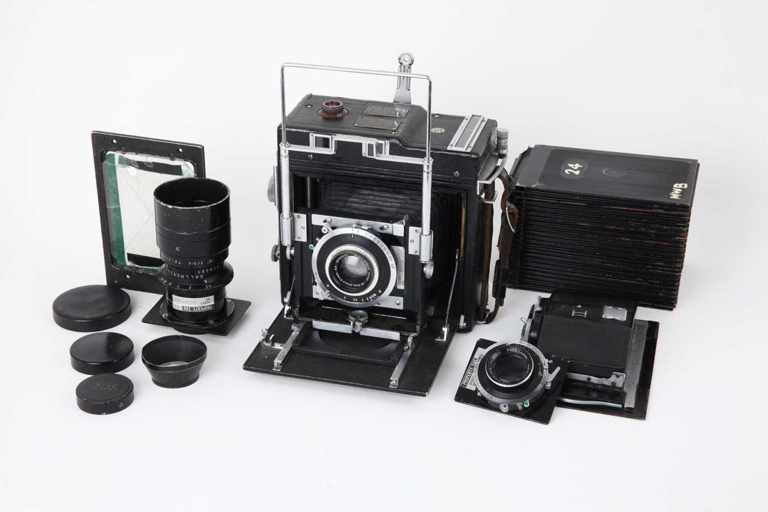 Lot 692 - A Van Neck Press Camera Outfit,