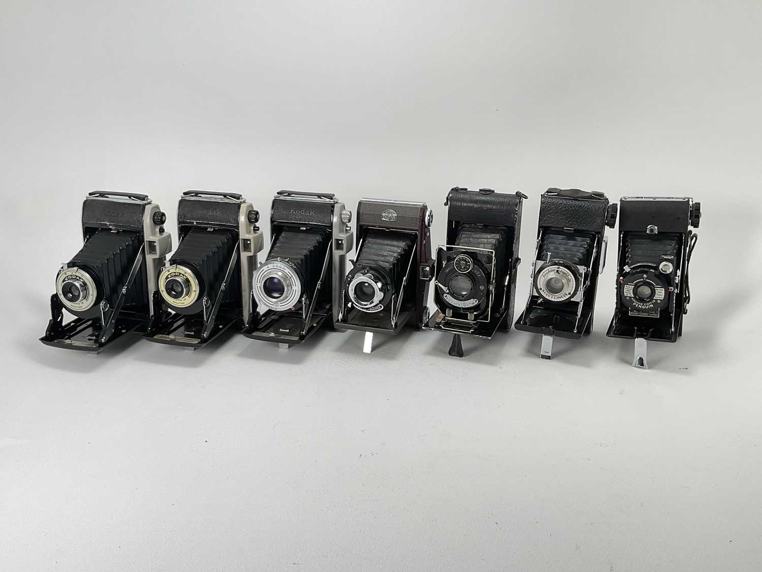 Lot 615 - A Selection of 7 Folding Cameras,