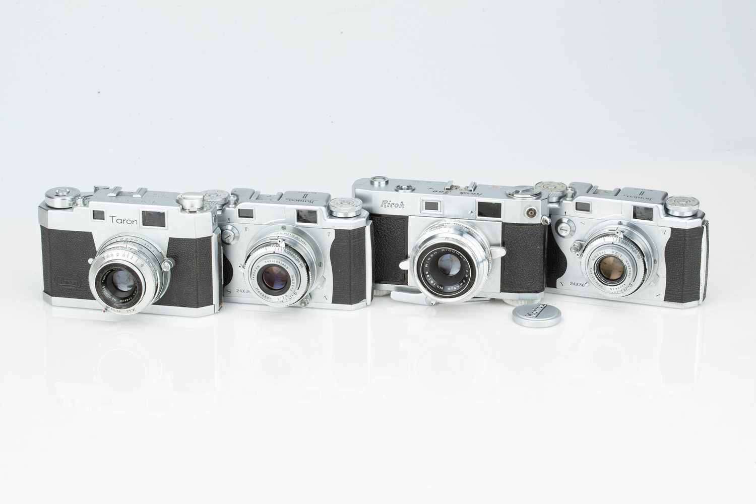 Lot 563 - Four Japanese Rangefinder Cameras,