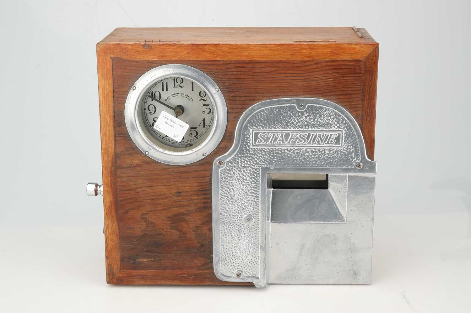 Lot 631 - A Stafsine oak cased clocking in clock,