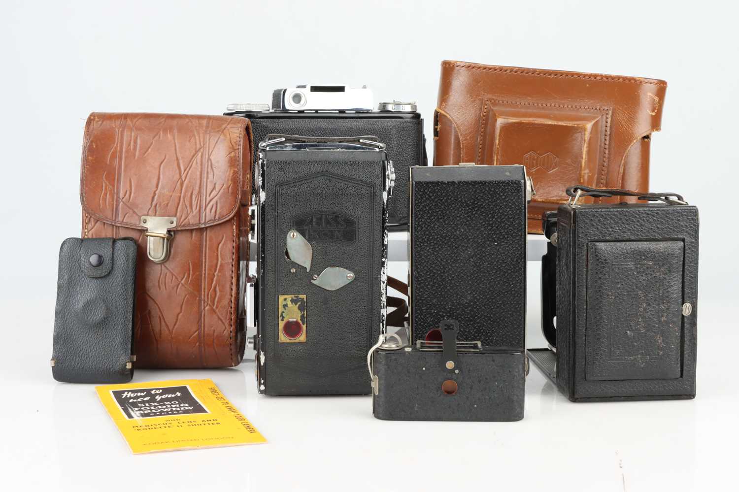 Lot 371 - A Selection of Five Folding Cameras,