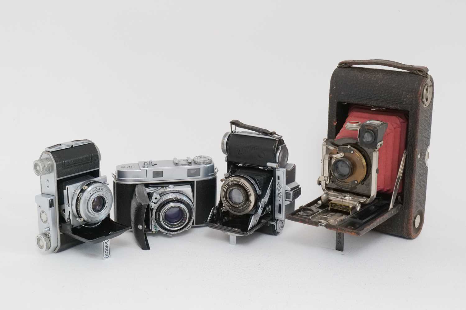 Lot 387 - A Selecton of Four Folding Cameras,
