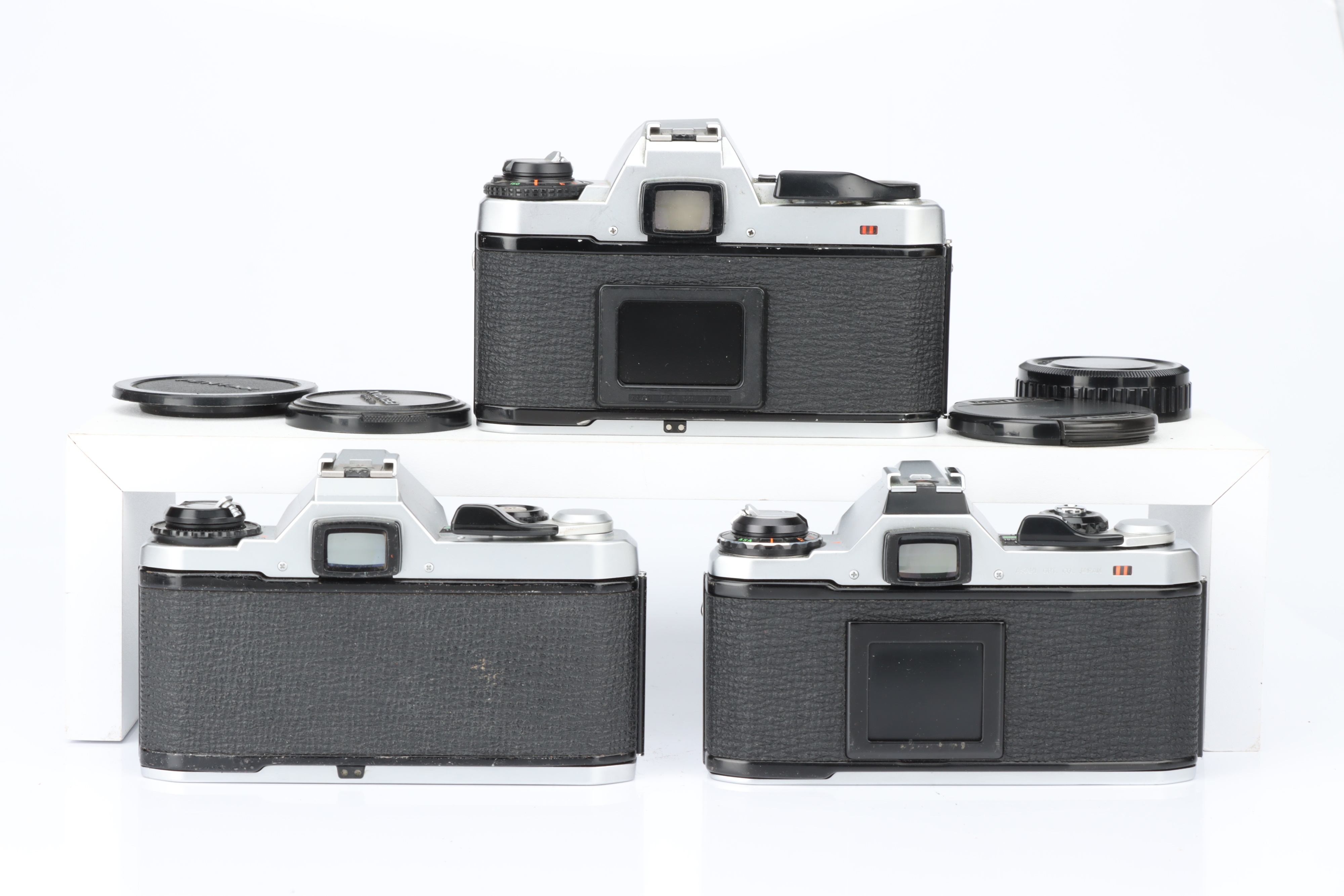 Lot 391 - Three Pentax SLR Cameras,