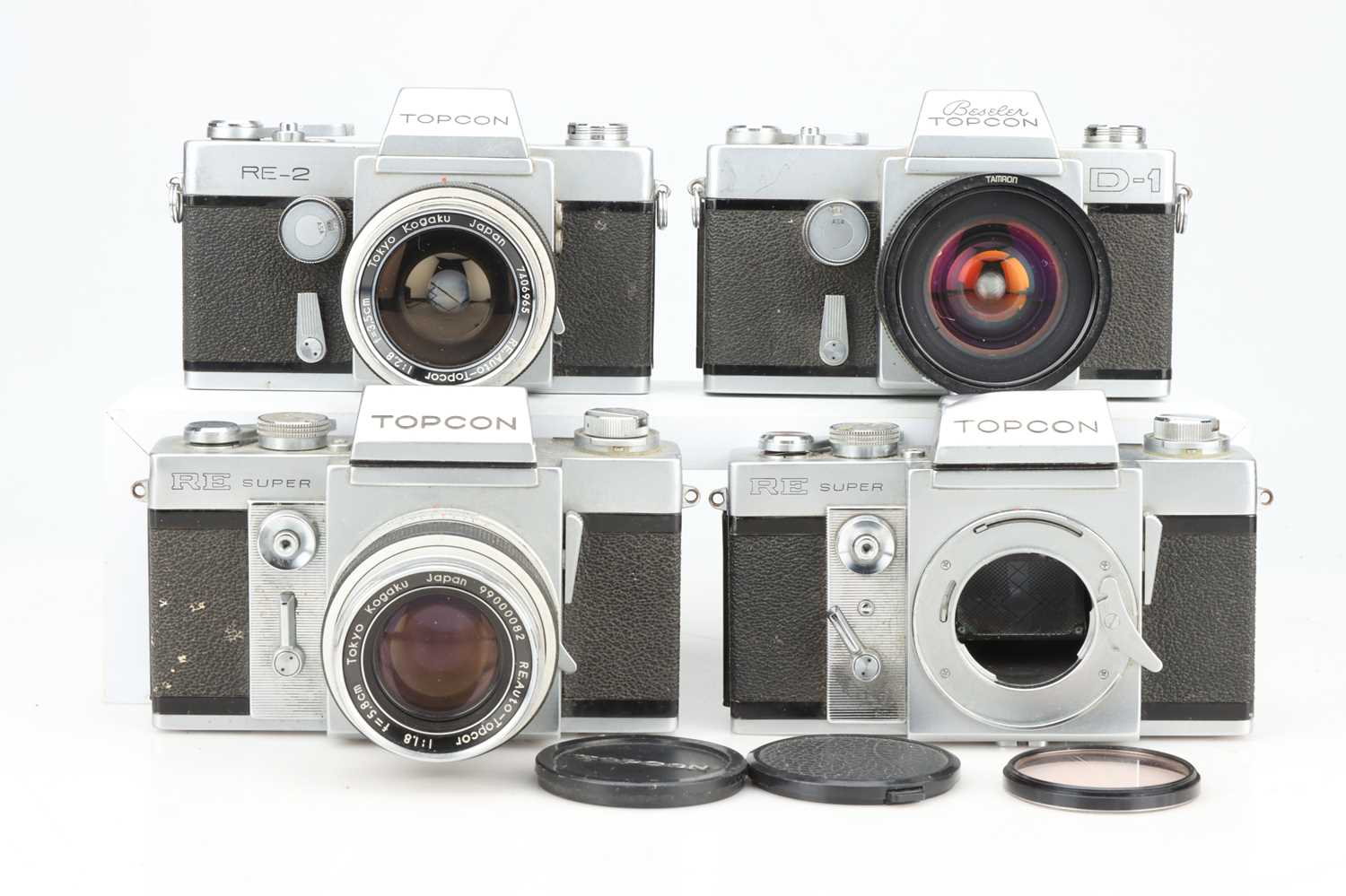 Lot 410 - Four Topcon SLR Cameras,