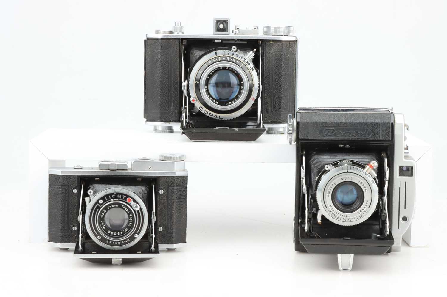 Lot 776 - Three Folding Cameras,