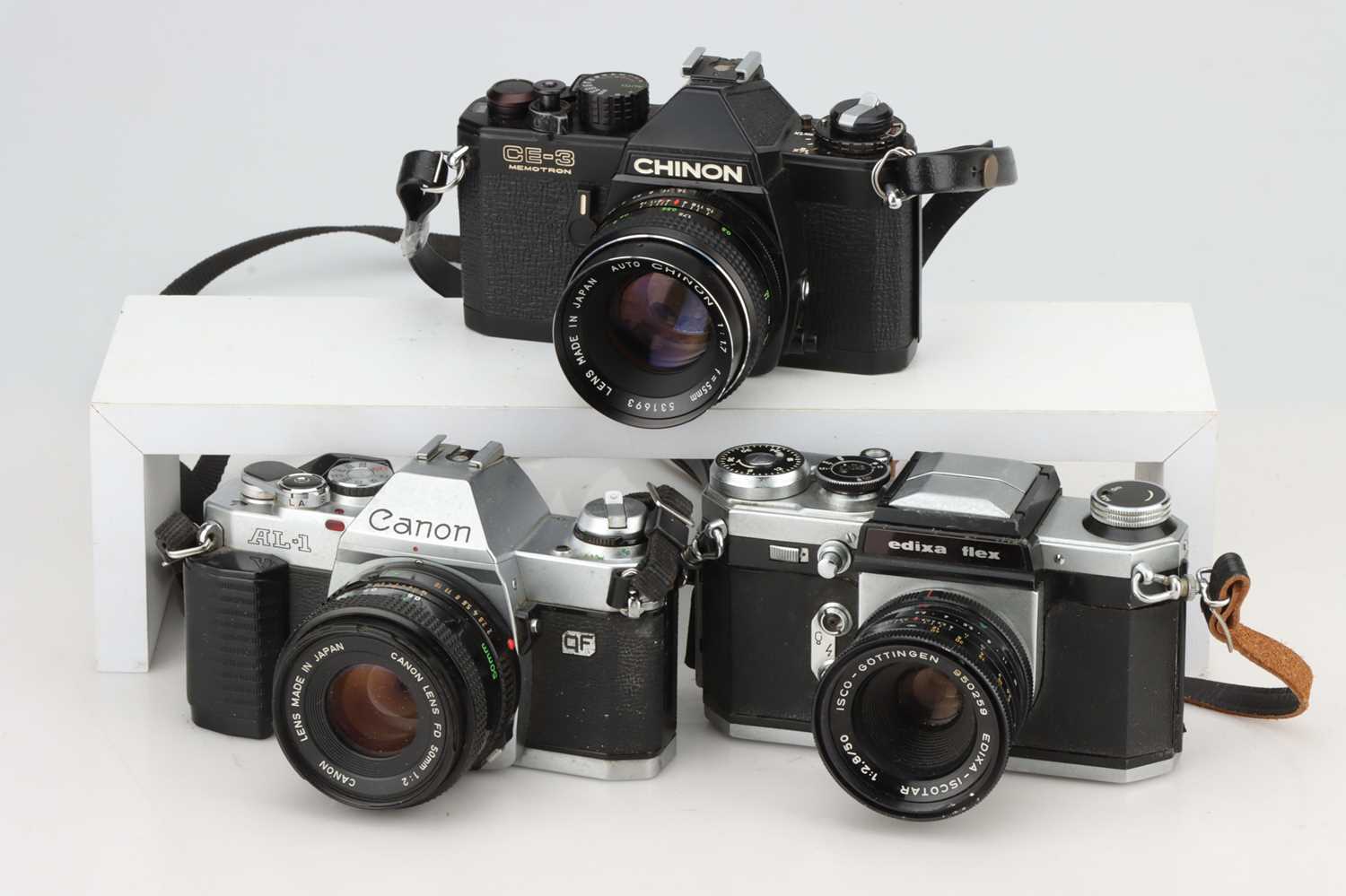 Lot 424 - Three SLR Cameras,