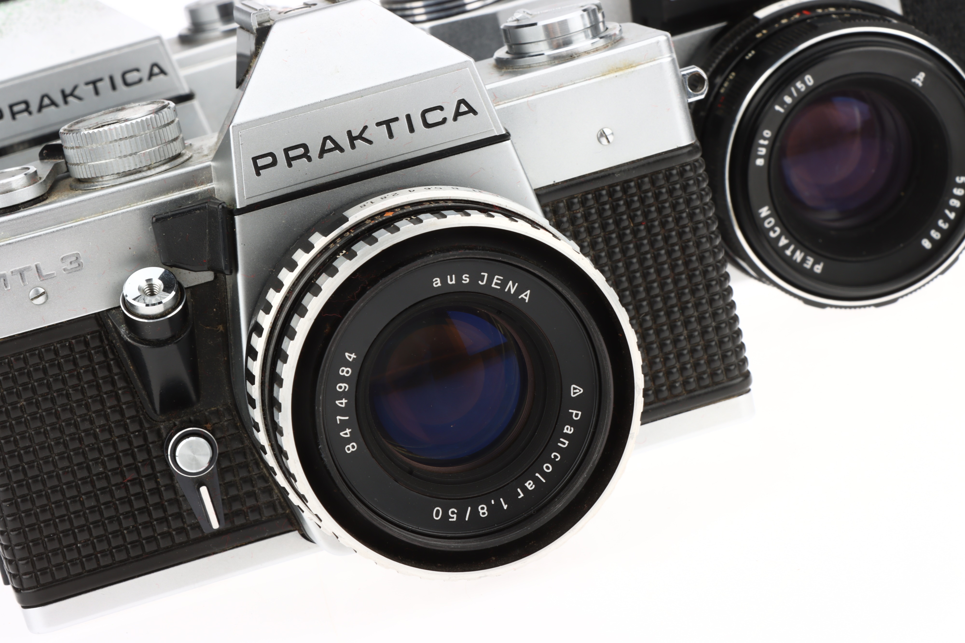 Lot 324 - A Selection of Six Praktica 35mm SLR Cameras,