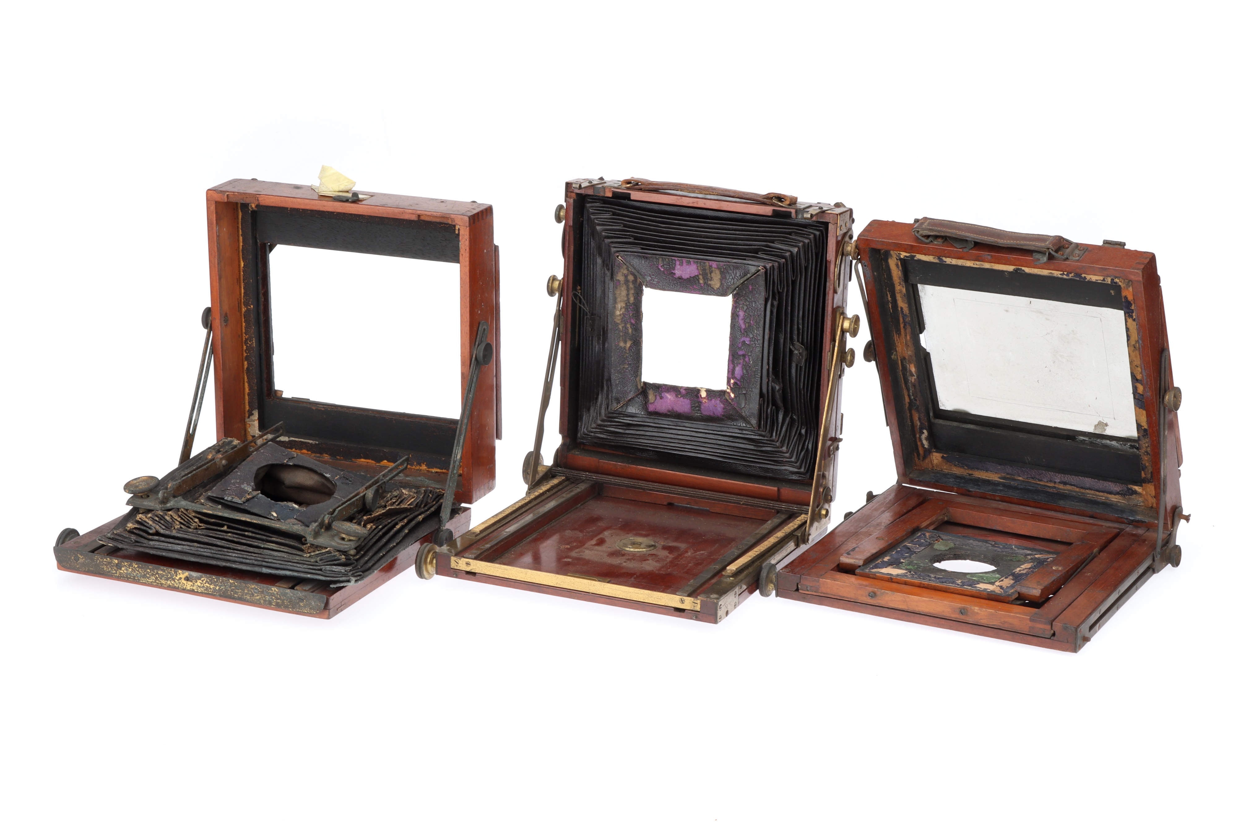 Lot 701 - Three Mahogany & Brass Cameras,
