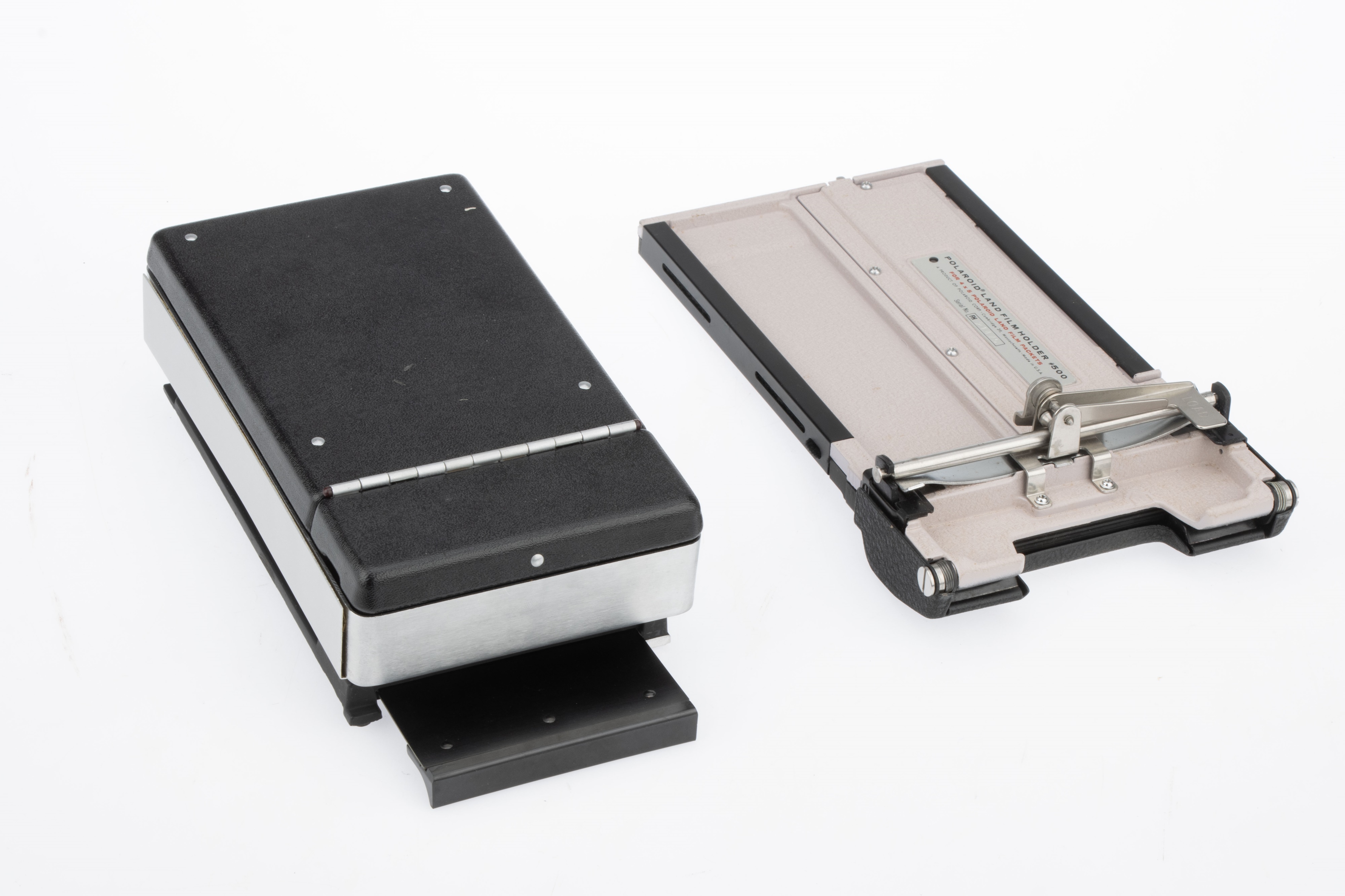 Lot 682 - Two Polaroid Film Backs,