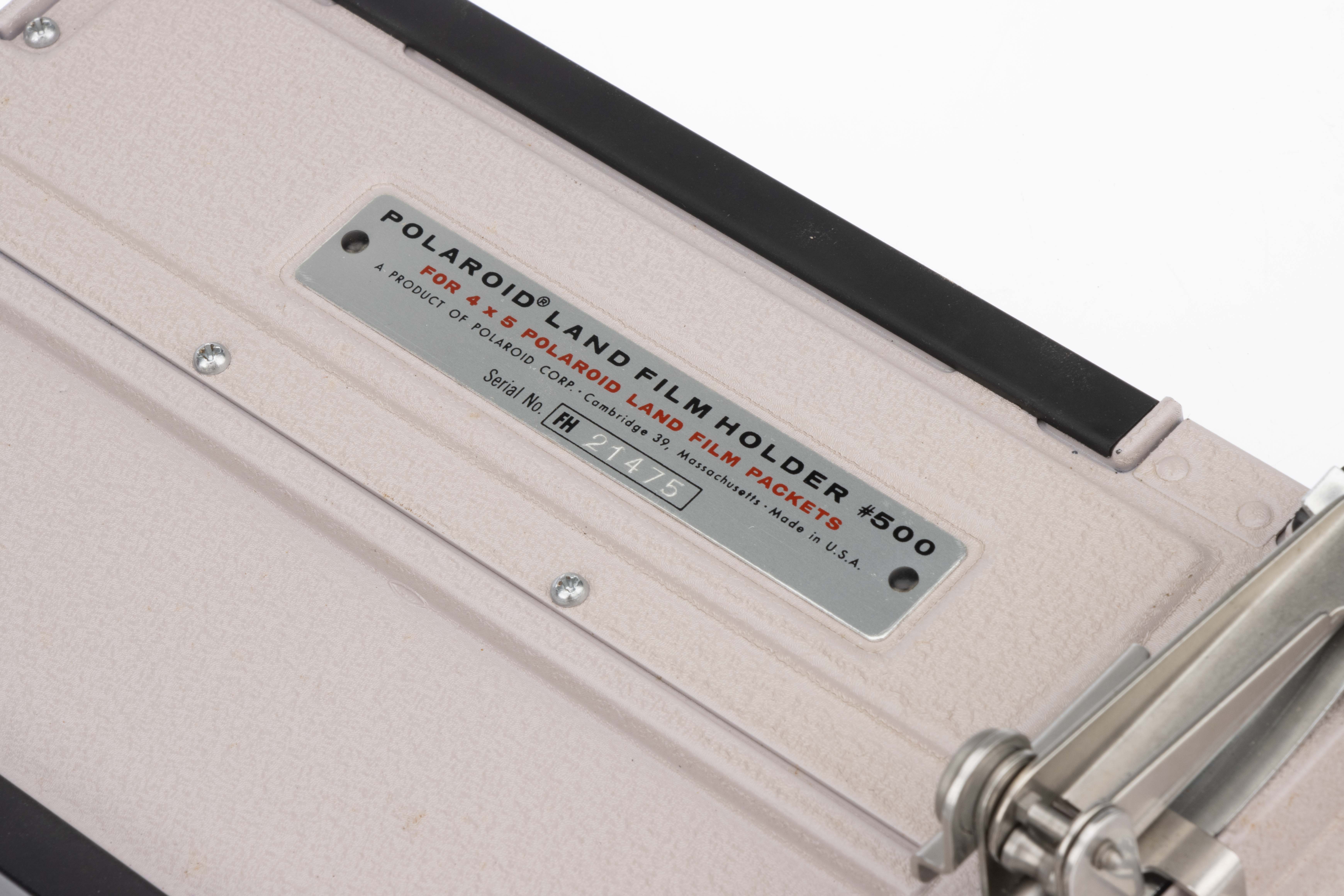 Lot 682 - Two Polaroid Film Backs,