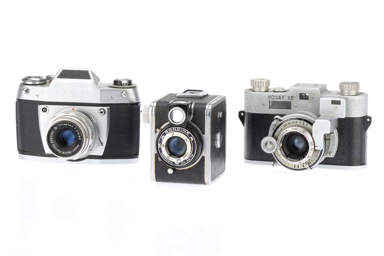 Lot 533 - A Selection of Three Analogue Film Cameras,