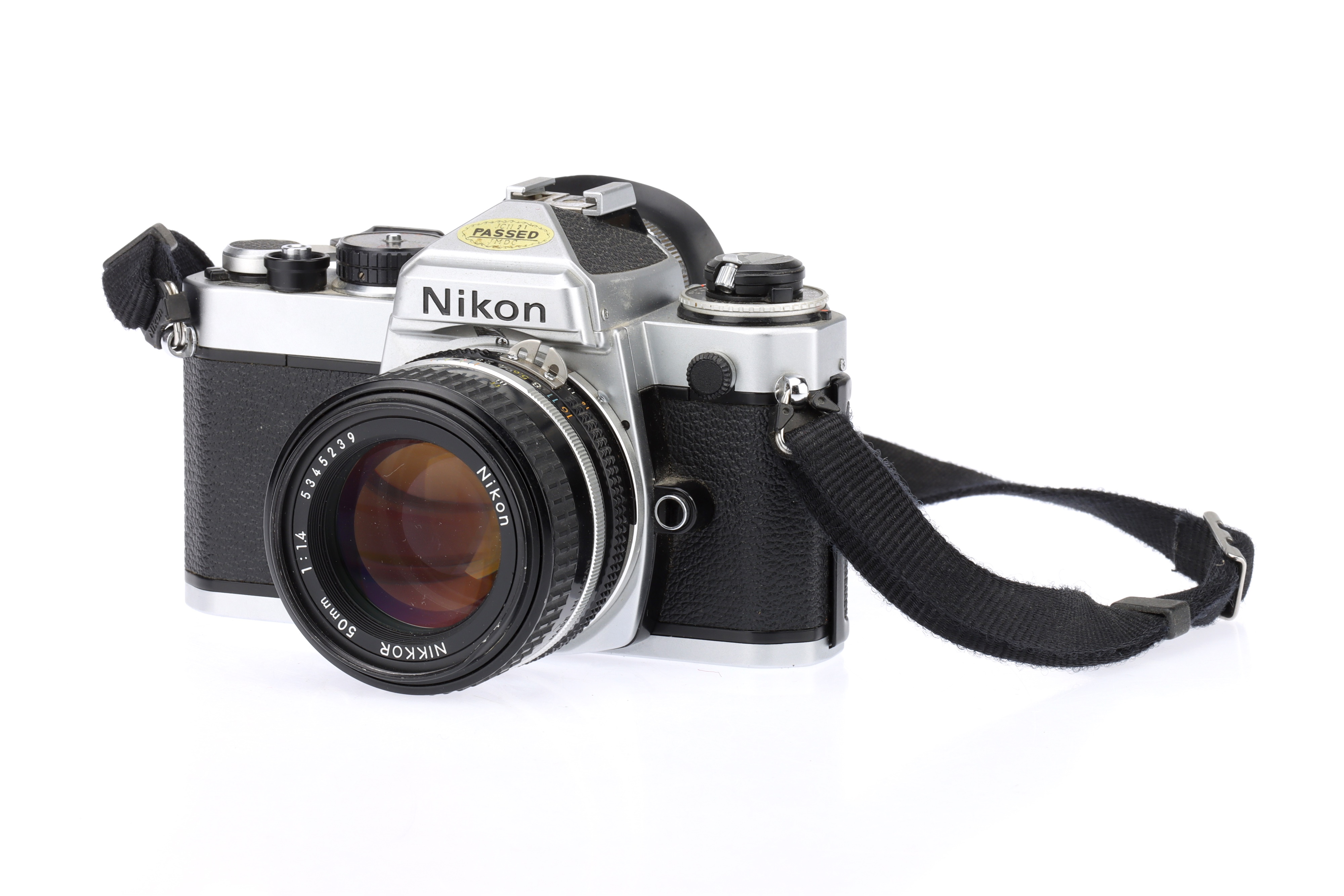 Lot 144 - A Nikon FE 35mm SLR Camera,