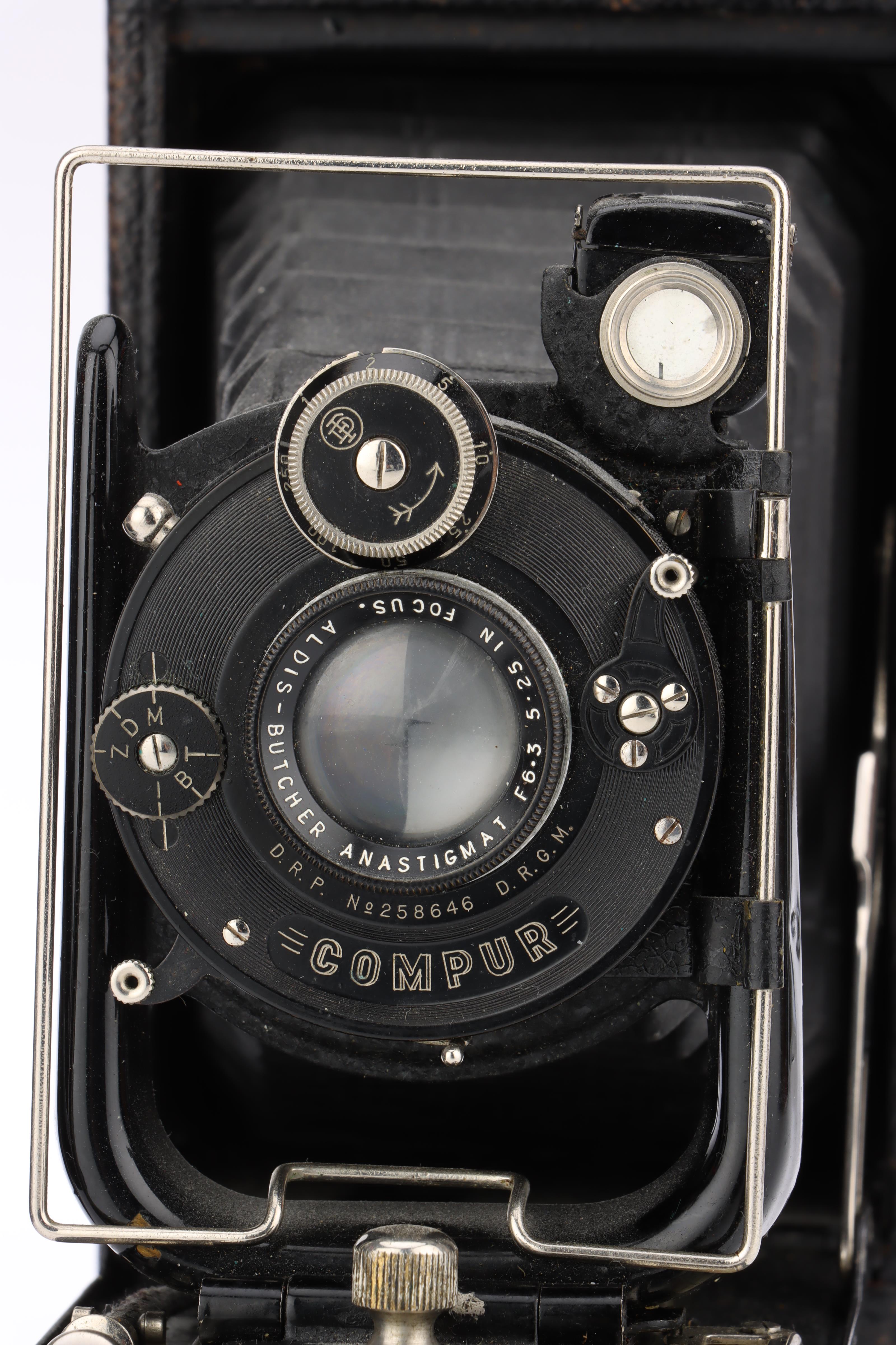 Lot 256 - A Selection of Three Folding Cameras of