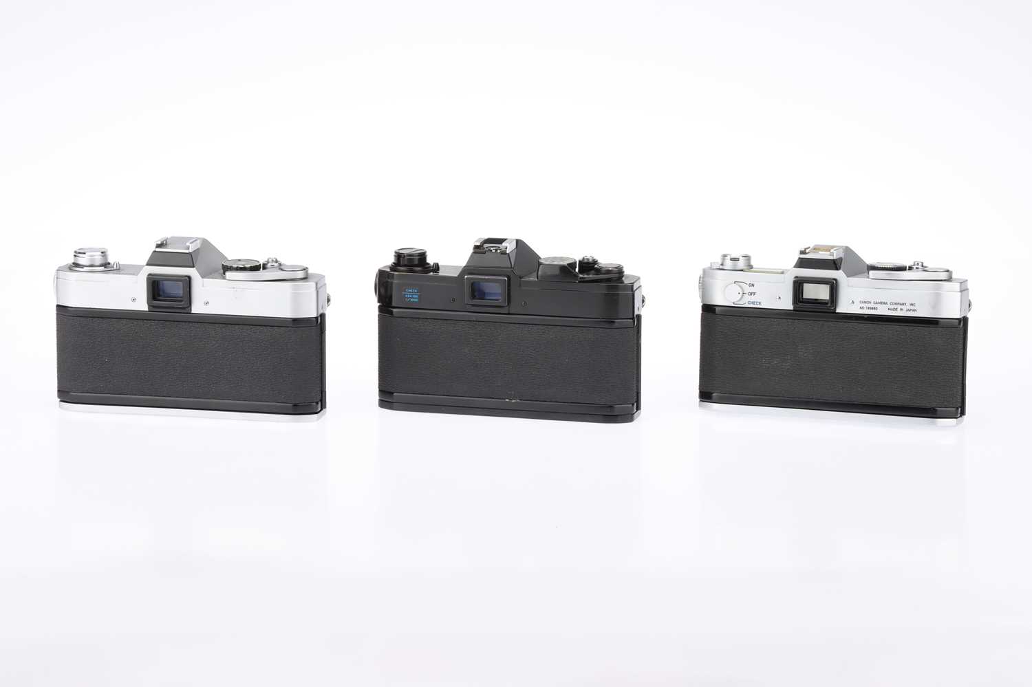 Lot 167 - A Canon FX SLR Camera and Two Canon SLR