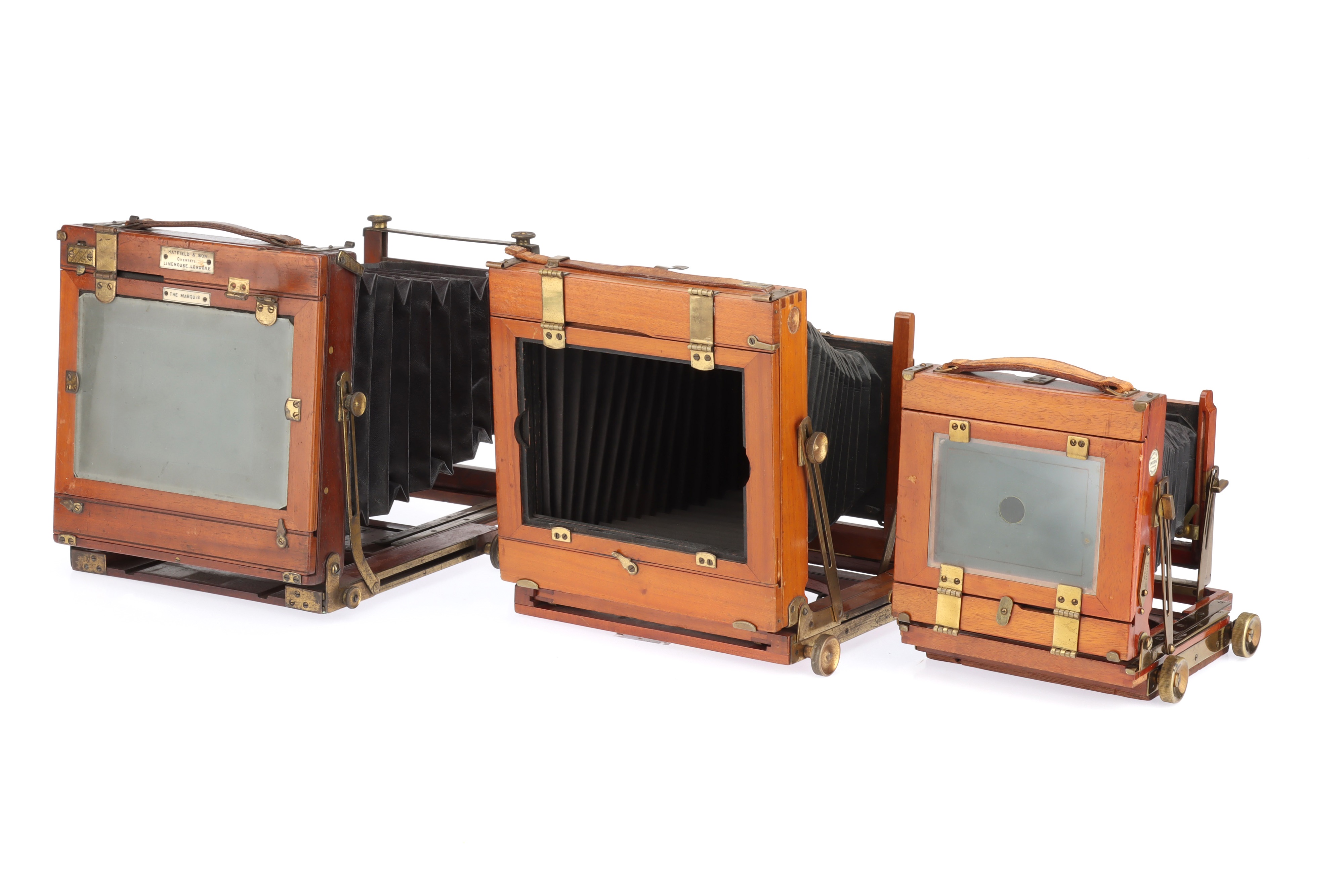 Lot 252 - Three Mahogany & Brass Large Format Field