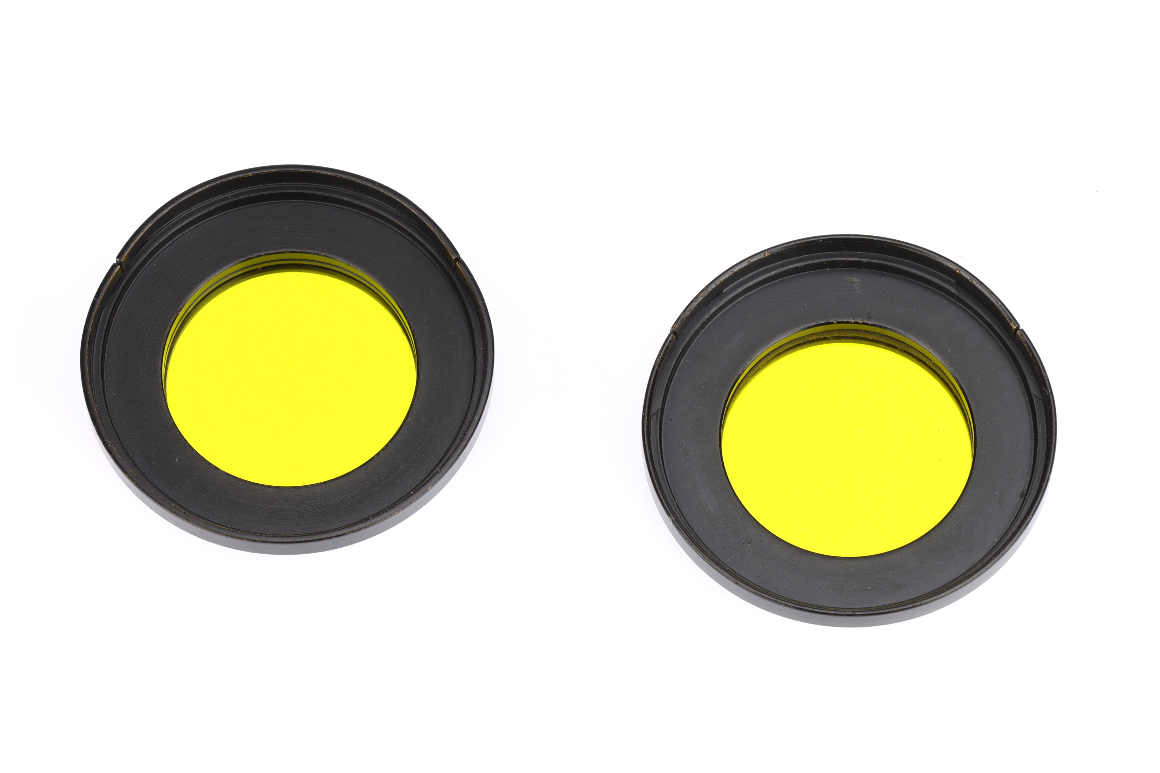 Lot 62 - Two Early Leica No.2 Slip-On Yellow Filter,