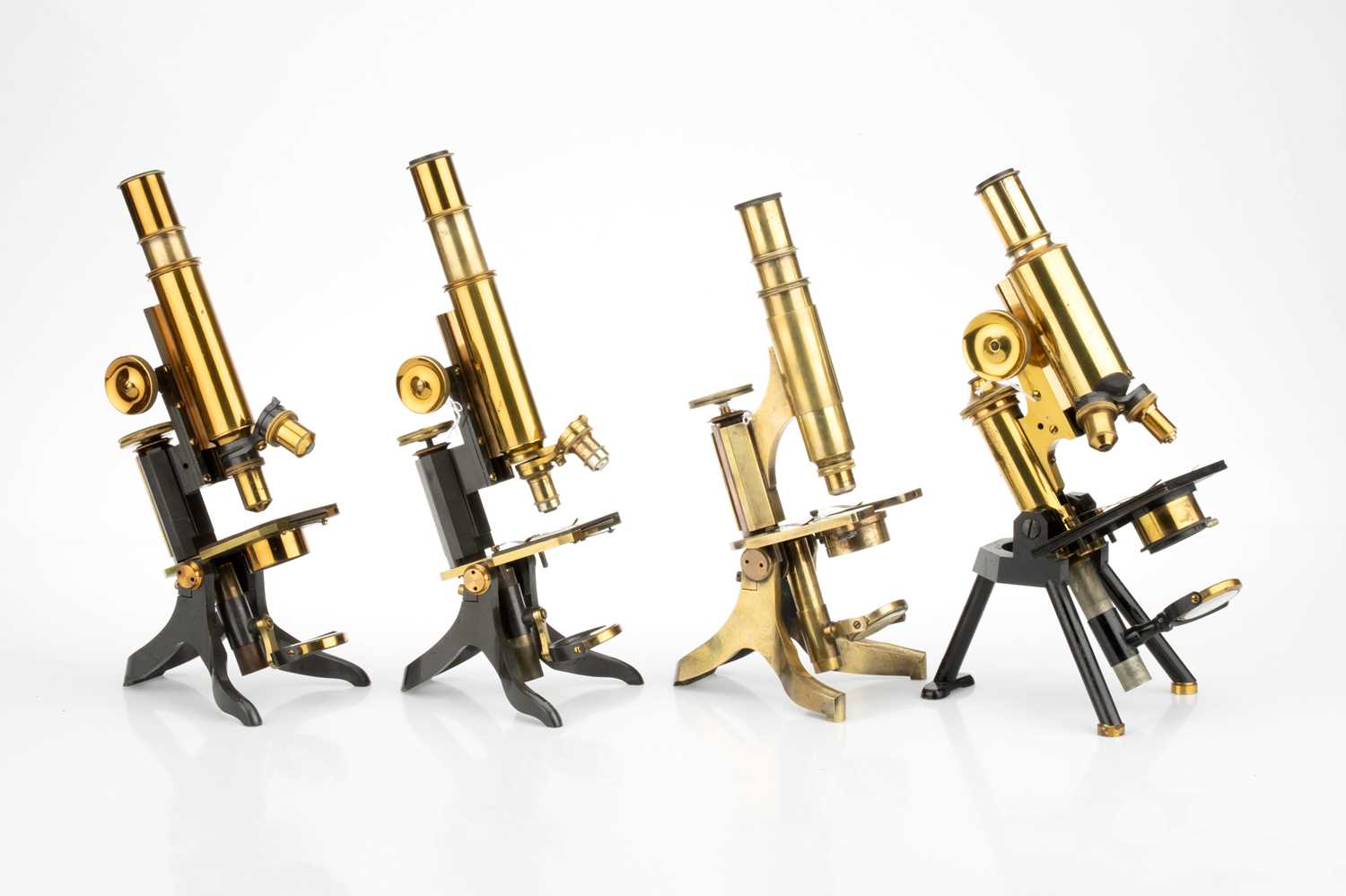 Lot 364 - A Collection of 4 Compound Brass Microscopes