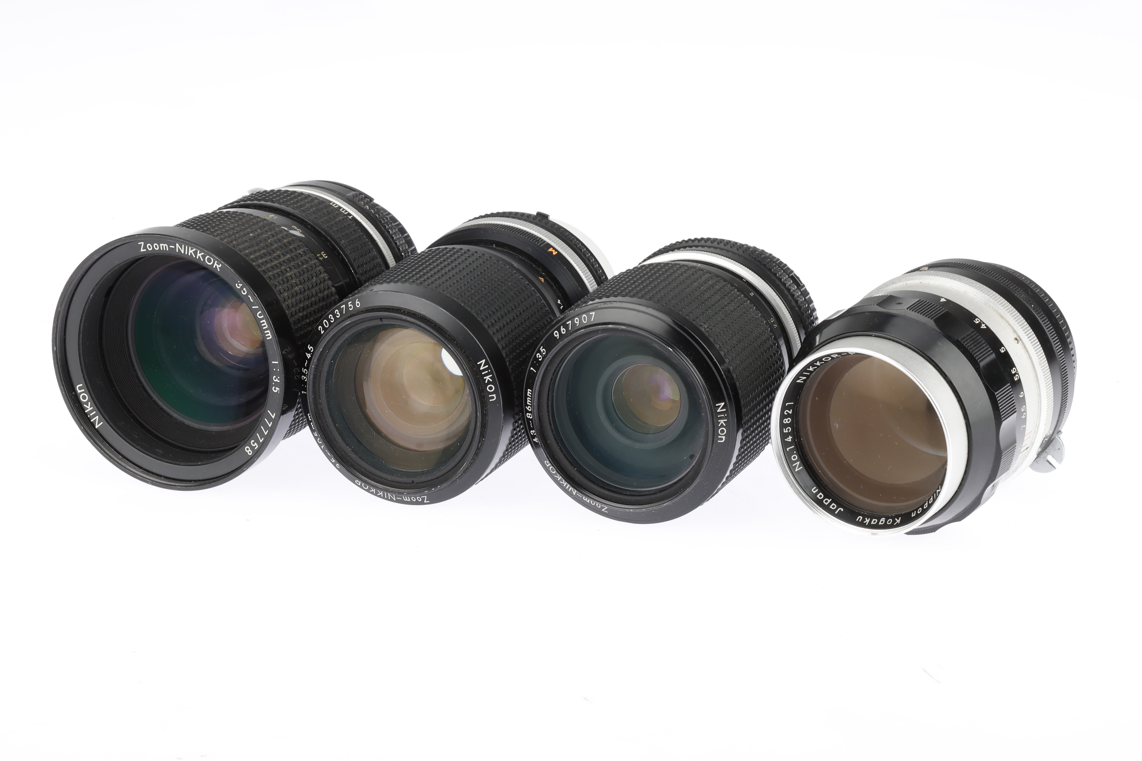 Lot 447 - Four Nikon Nikkor Lenses