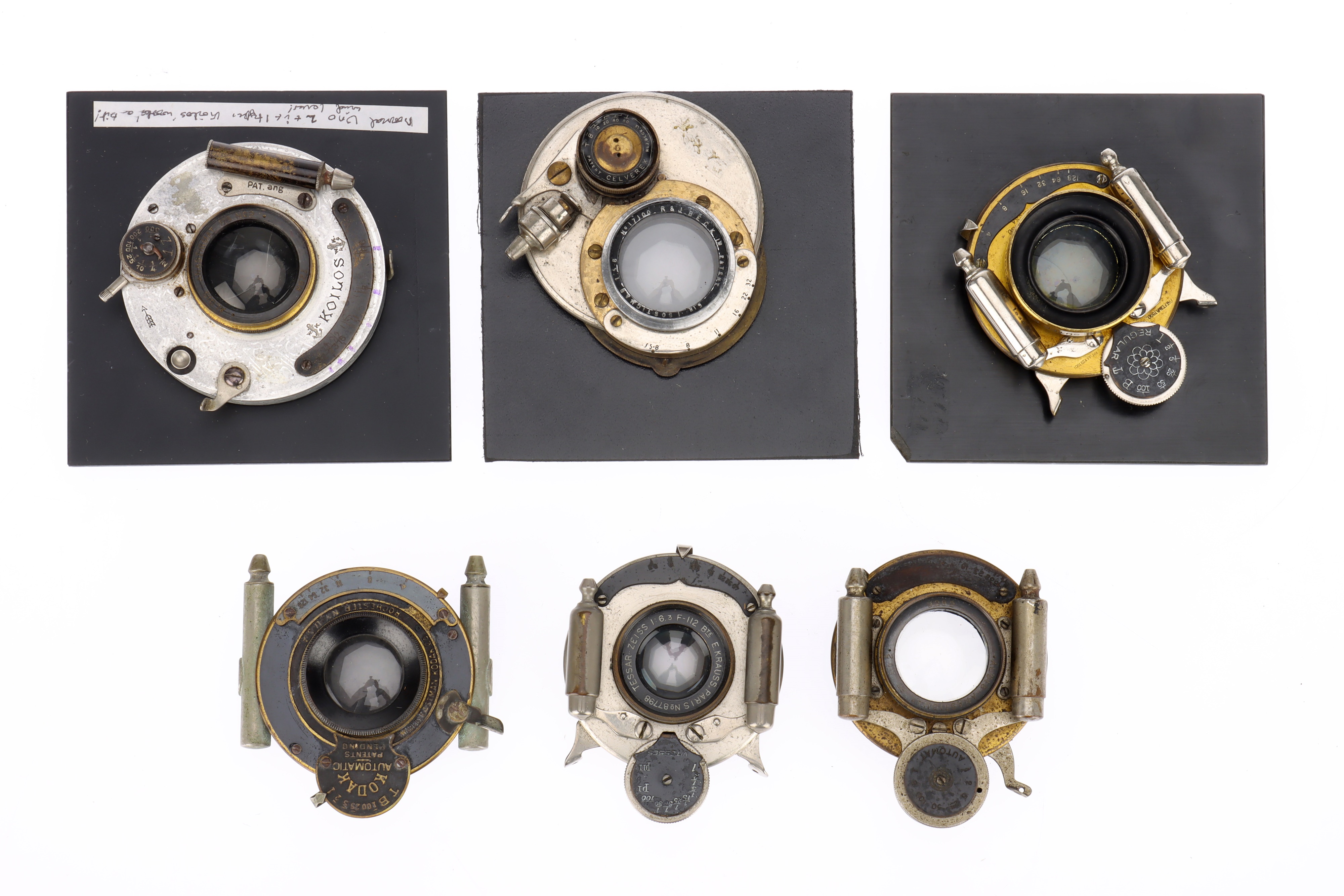 Lot 699 - A Selection of Lenses in Pneumatic Shutters,