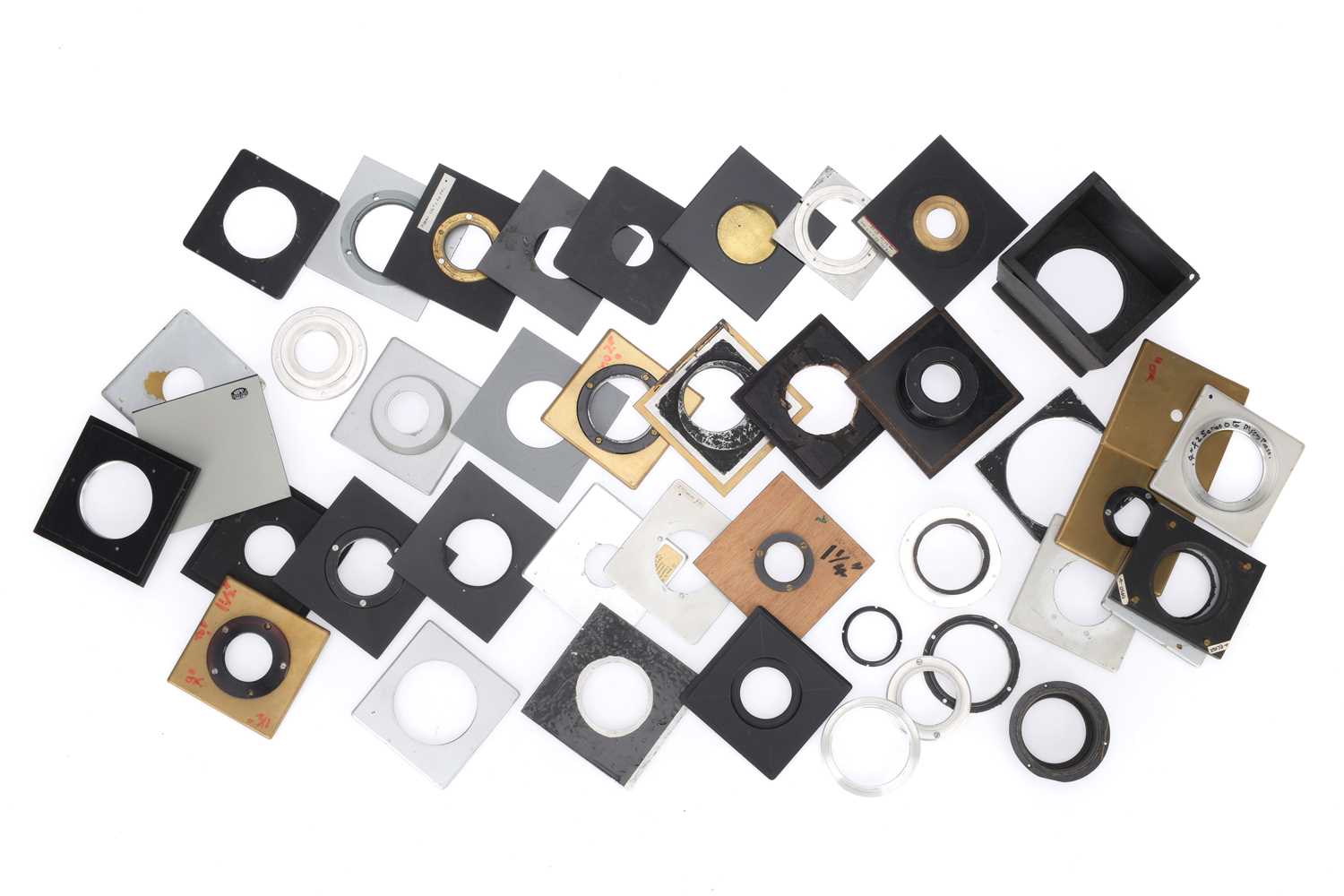 Lot 557 - A Large Quantity of Lens Boards and Mounts,