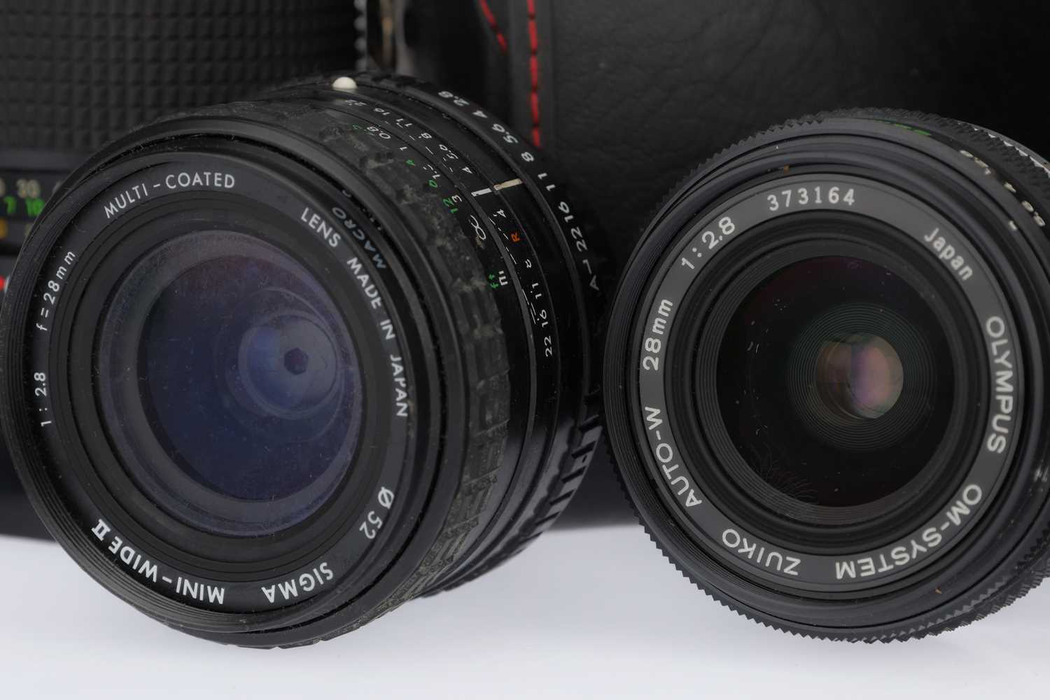 Lot 228 - A Mixed Selection of Camera Lenses,