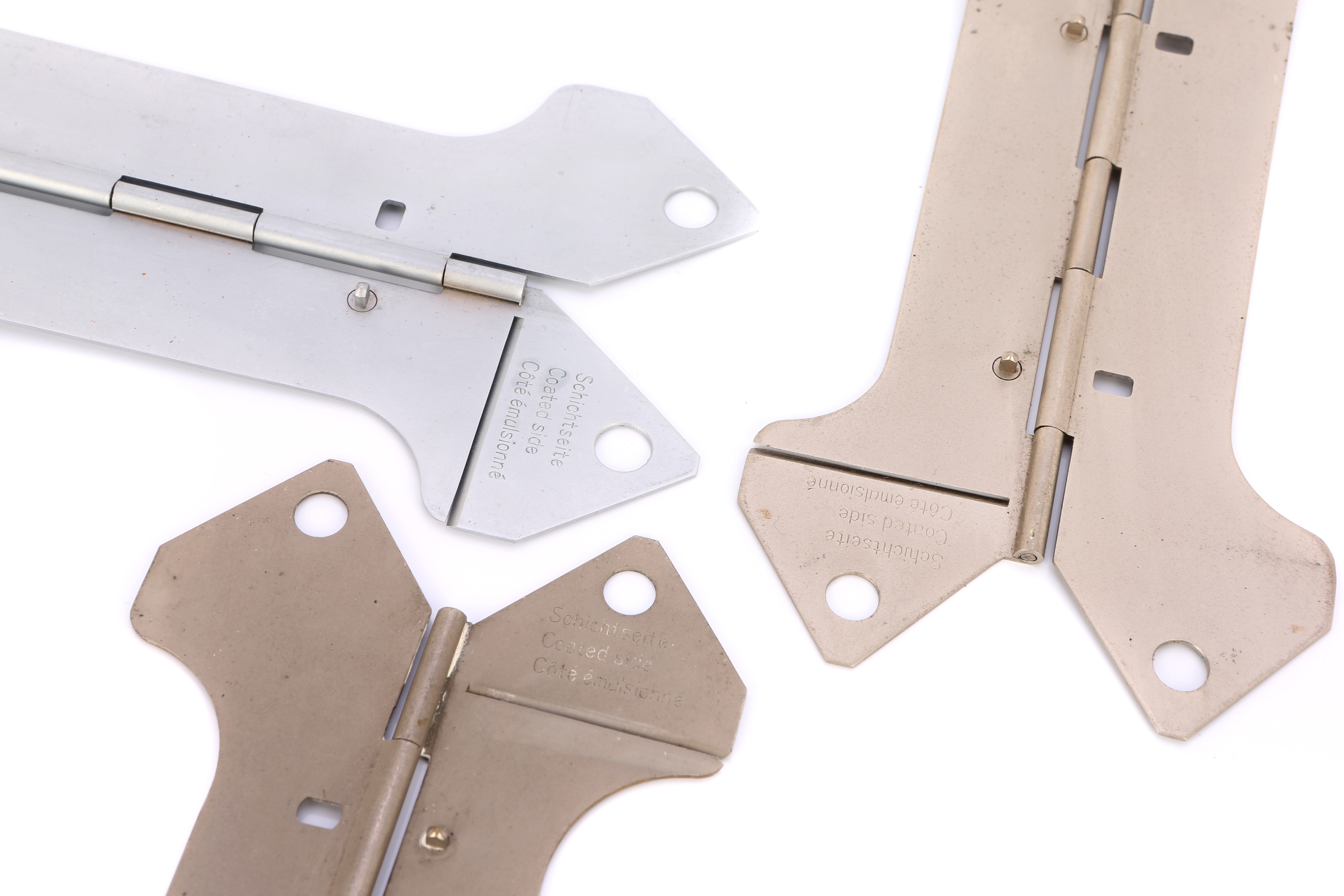 Lot 186 - Three Leica ABLON Film Trimming Templates,