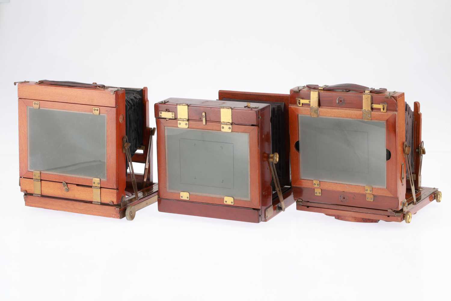 Lot 180 - A Group of Mahogany and Brass Cameras,