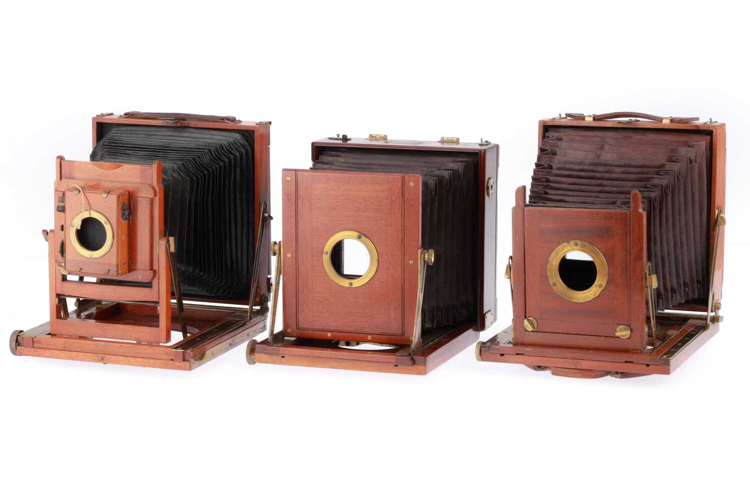 Lot 180 - A Group of Mahogany and Brass Cameras,