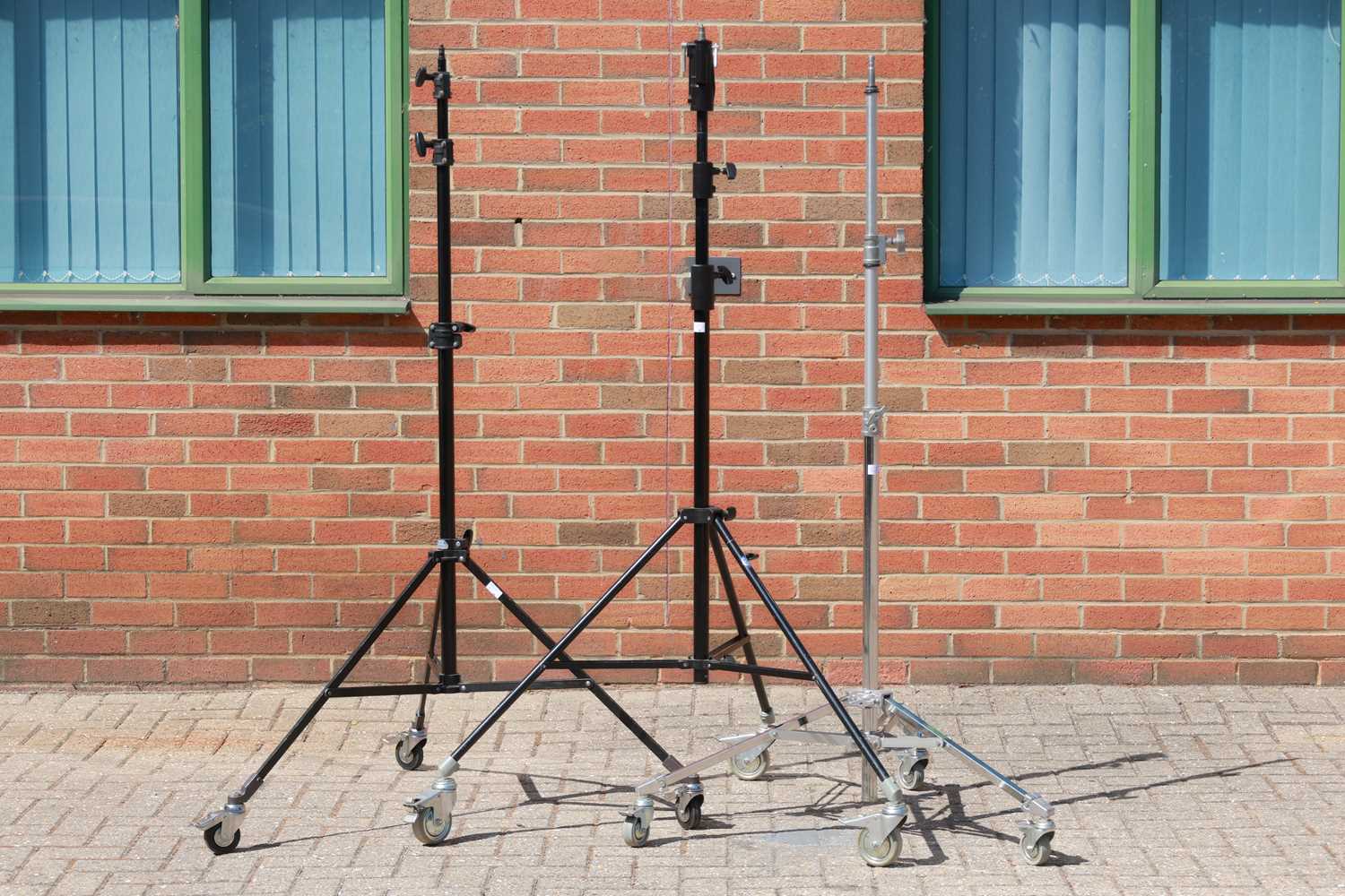 Lot 424 - Three Dolly-Type Studio Lighting Stands,