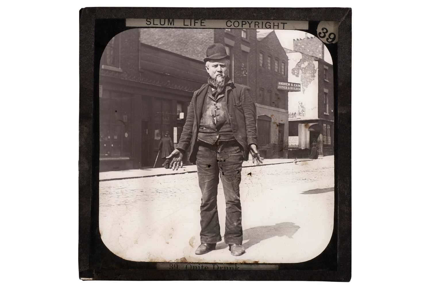 Lot 154 - Magic Lanterm Slide Set, Slum Life in one of