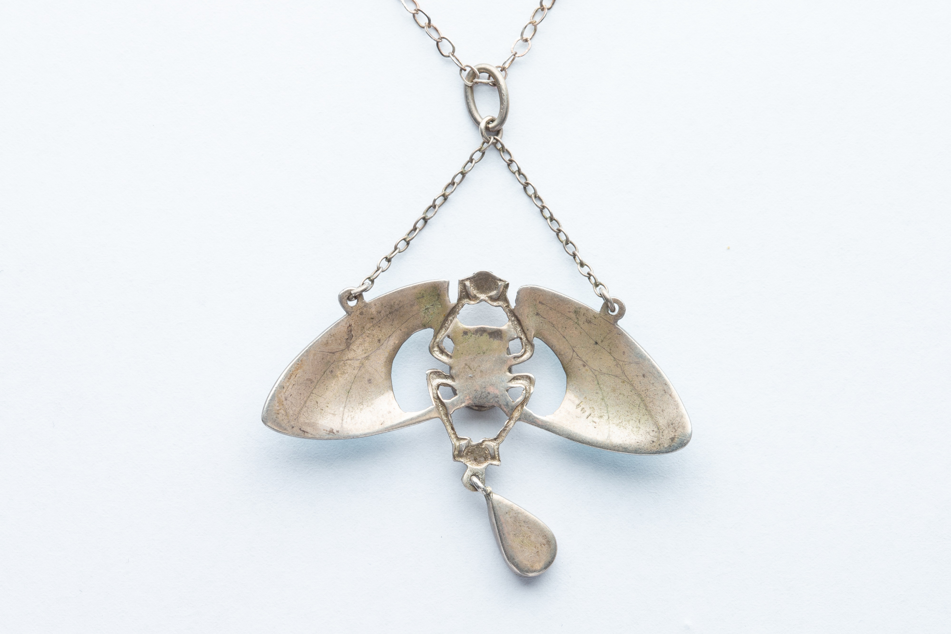 Lot 52 - A Fine Silver & Engine Turned Enamel Pendant,