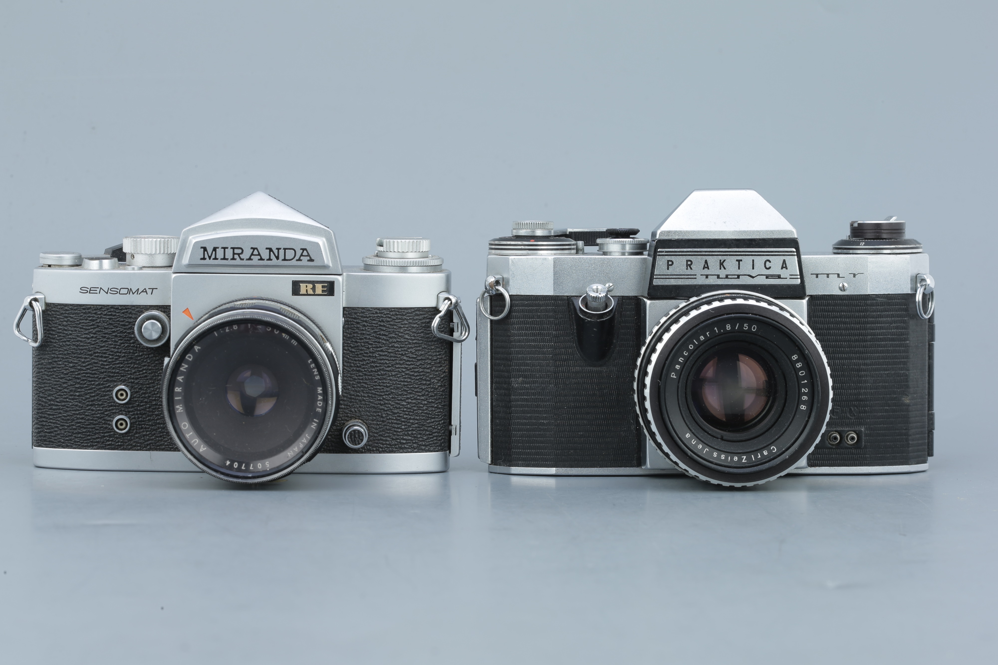 Lot 384 - A Selection of Various SLR Cameras,